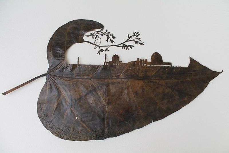 Leaf Art: Artist creates intriguing artwork on fallen leaves