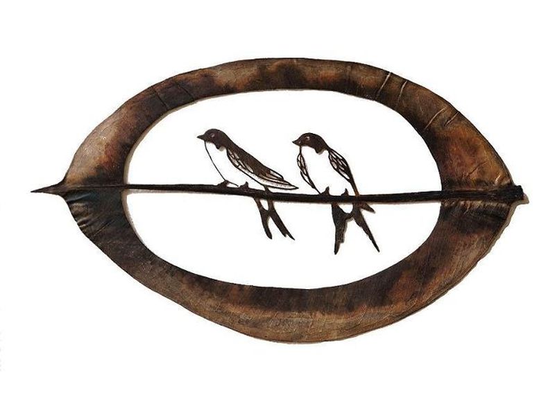 Leaf Art: Artist creates intriguing artwork on fallen leaves